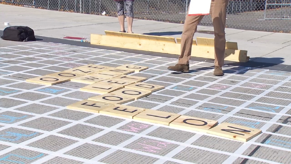Life-sized Scrabble game takes over busy street on Seattle's Capitol ...